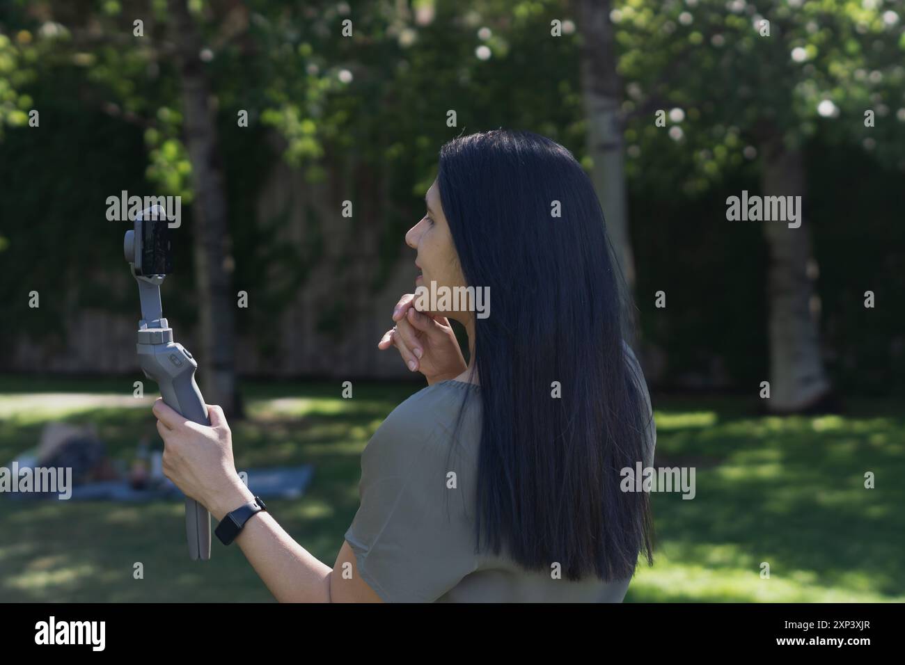 Adult female looking camera speaking hi-res stock photography and ...