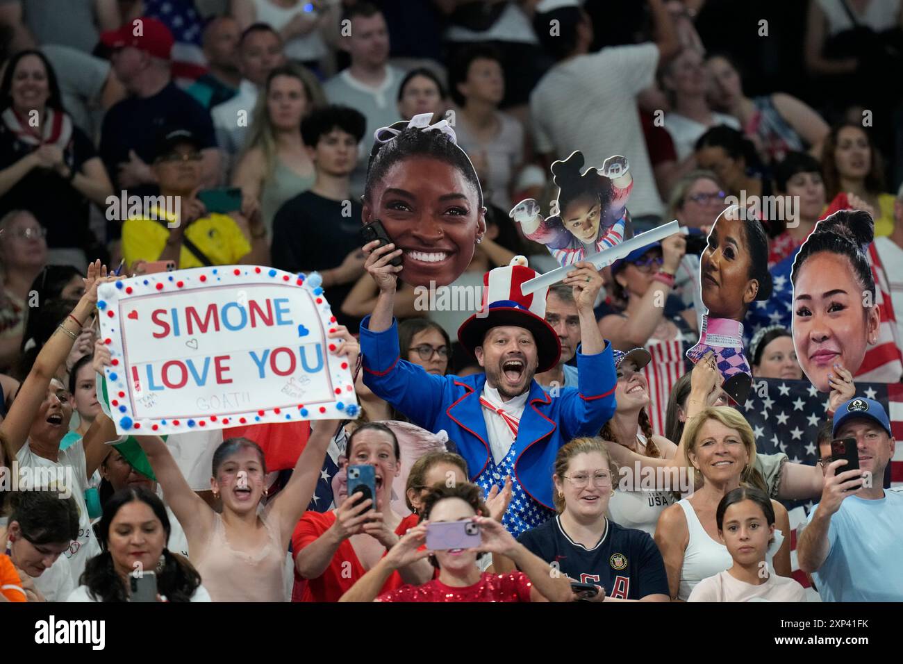 Fans cheer during the women's artistic gymnastics team finals round at ...