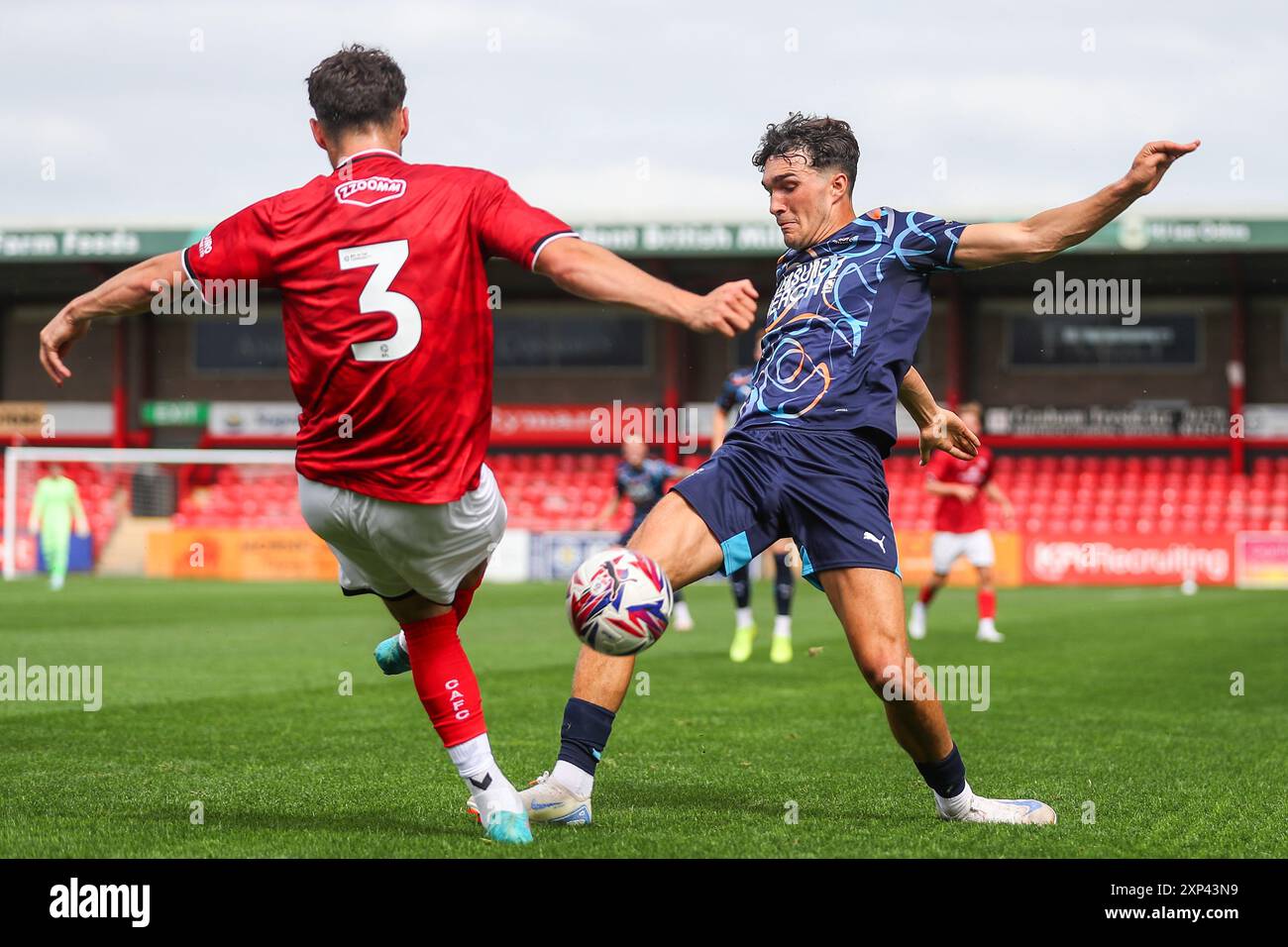 Kyle Joseph of Blackpool tackles Jamie Knight-Lebel of Crewe Alexander ...