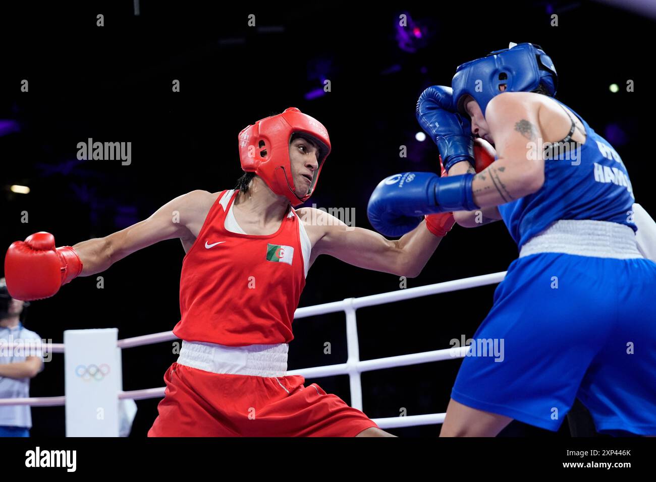 Algeria's Imane Khelif, left, fights Hungary's Anna Hamori in their ...