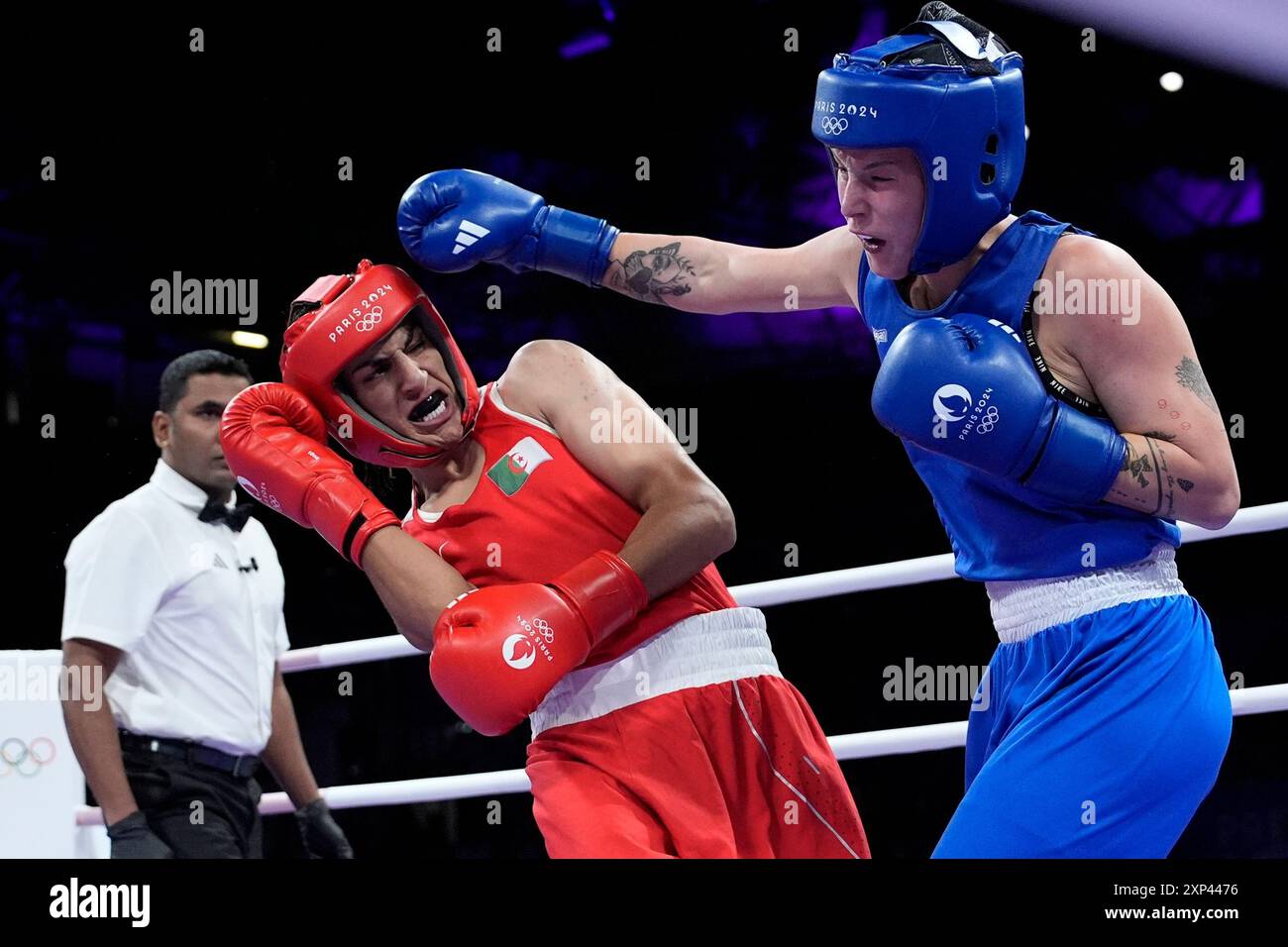 Algeria's Imane Khelif, left, fights Hungary's Anna Hamori in their ...