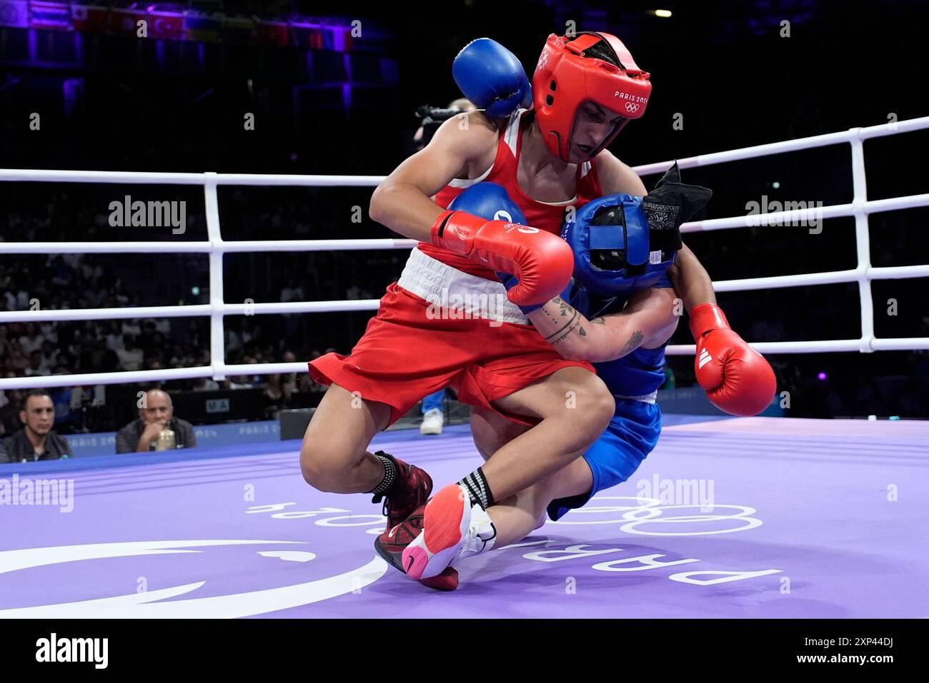 Algeria's Imane Khelif, red, fights Hungary's Anna Hamori in their ...
