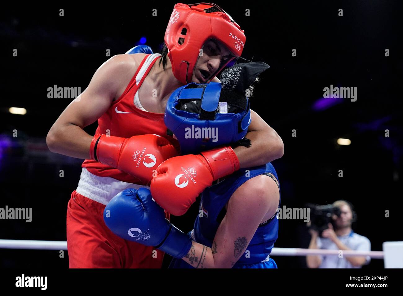 Algeria's Imane Khelif, left, fights Hungary's Anna Hamori in their ...