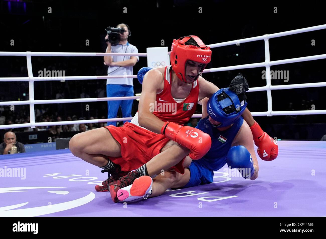 Algeria's Imane Khelif, red, fights Hungary's Anna Hamori in their ...