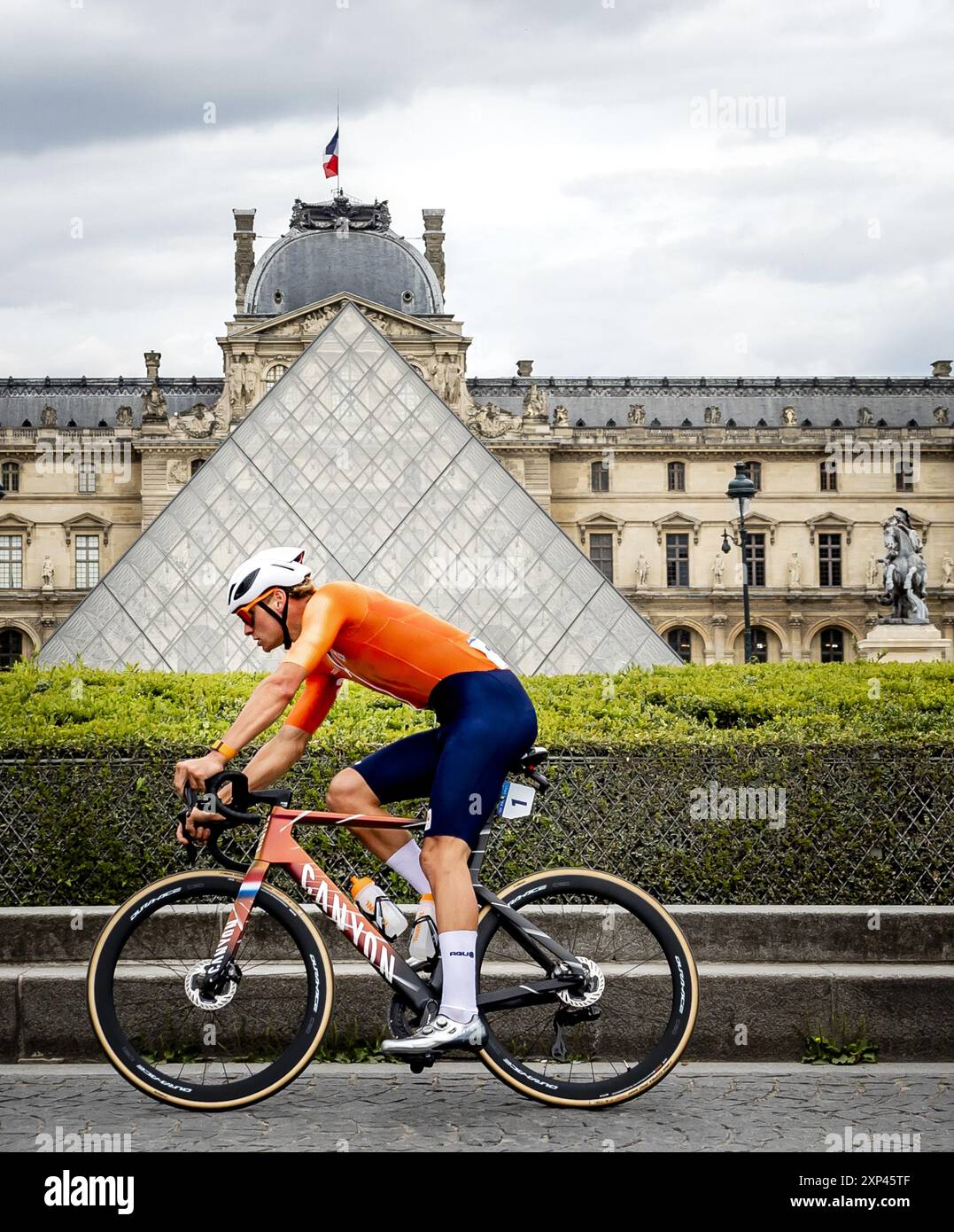 PARIS - Cyclist Mathieu van der Poel in front of the Louvre during the ...
