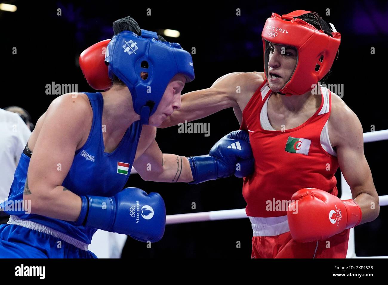 Algeria's Imane Khelif, right, fights Hungary's Anna Hamori in their ...