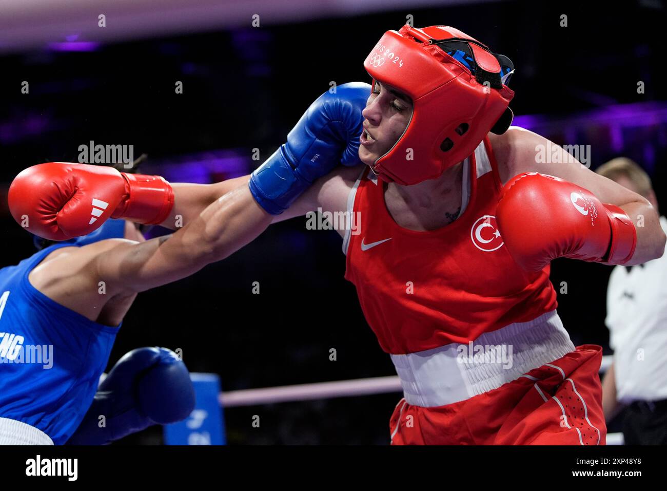 Turkey's Busenaz Surmeneli, right, fights Thailand's Janjaem ...
