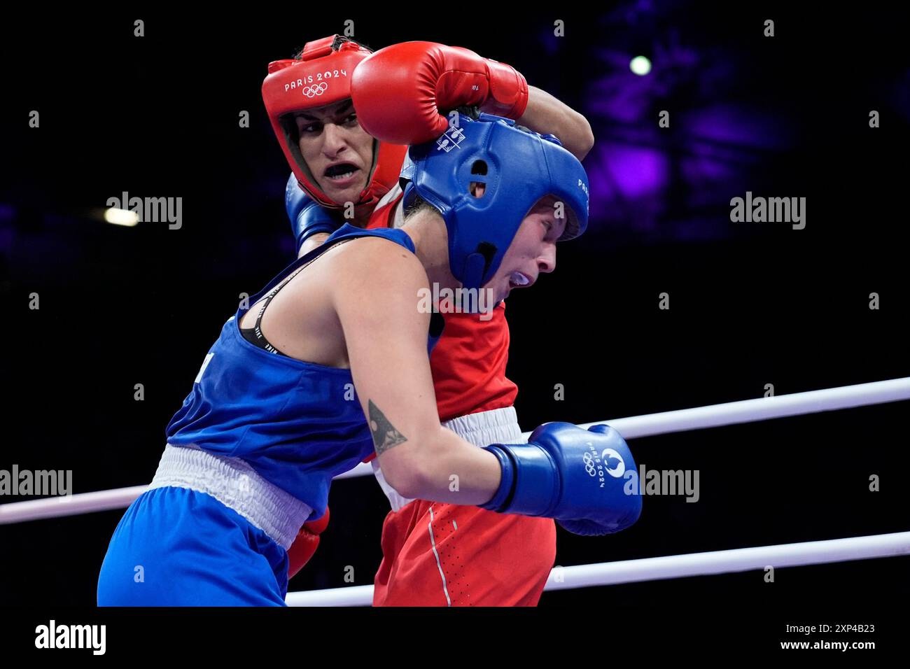 Algeria's Imane Khelif, left, fights Hungary's Anna Hamori in their ...