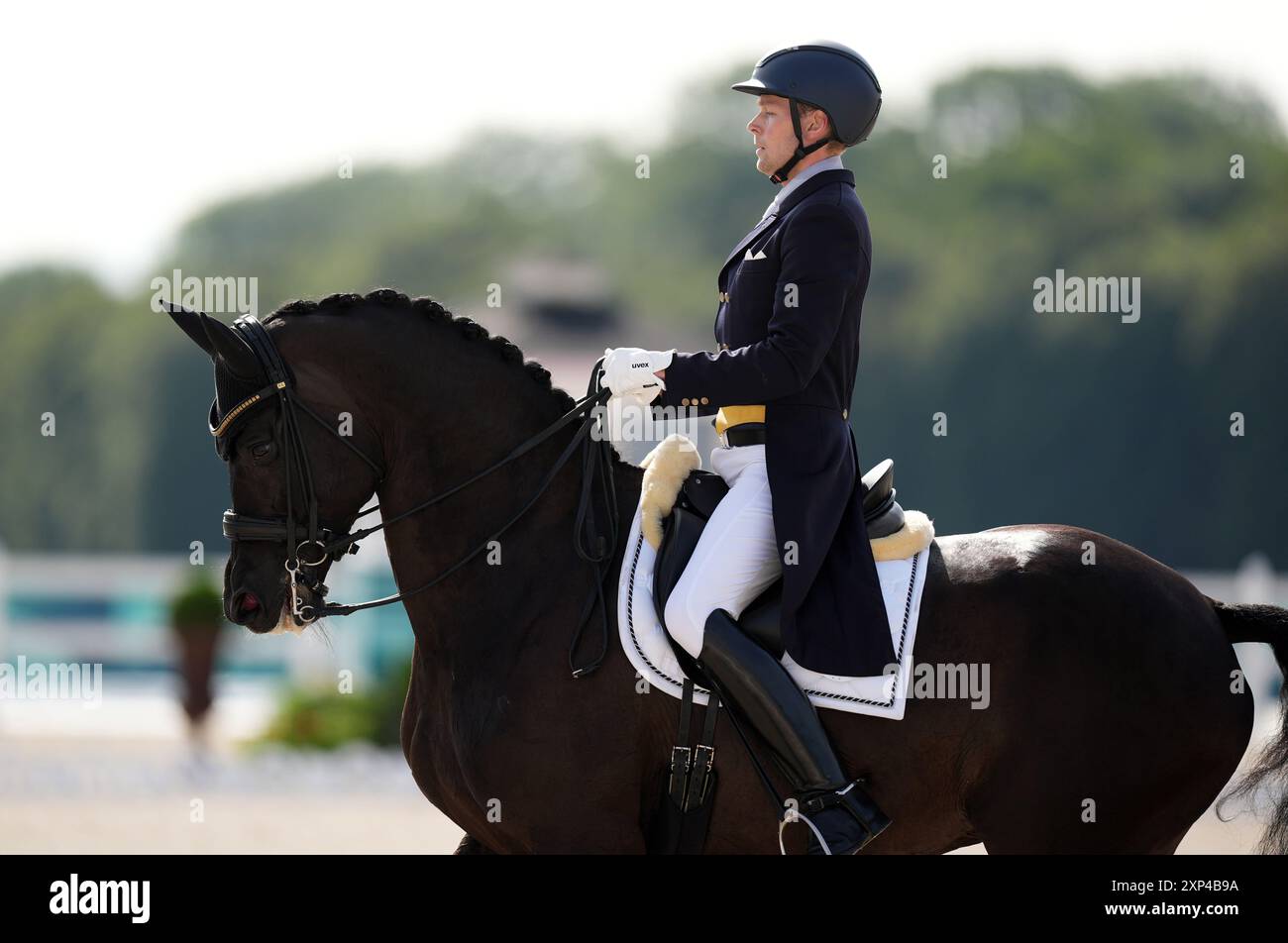 Finland's Henri Ruoste aboard Tiffanys Diamond during the Dressage Team ...