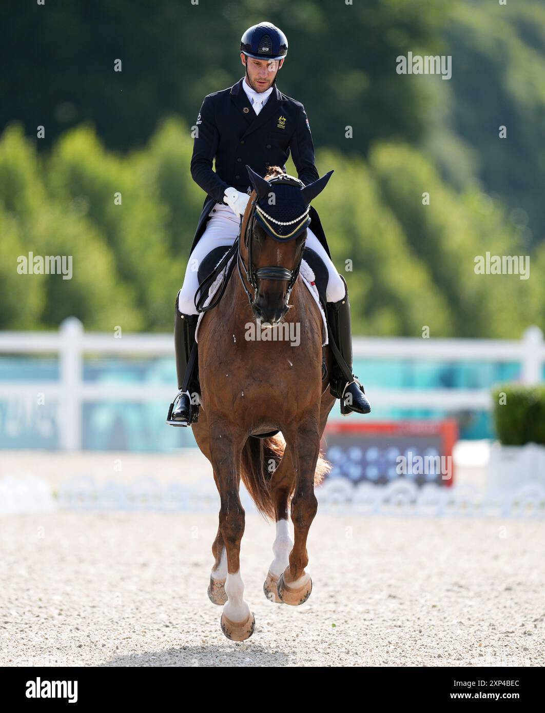 Australia's Jayden Brown aboard Quincy B during the Dressage Team Grand ...