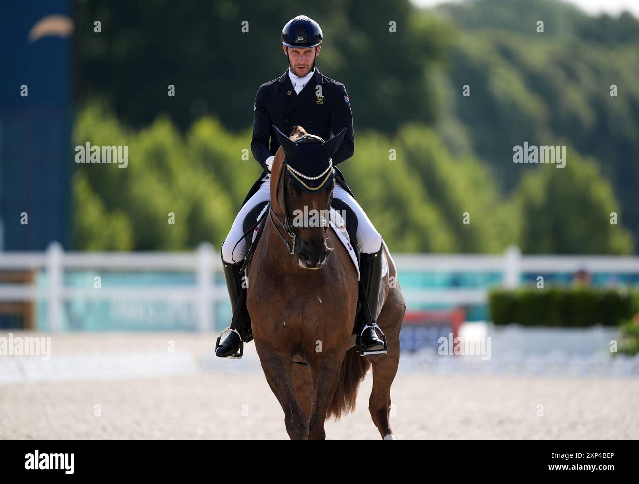 Australia's Jayden Brown aboard Quincy B during the Dressage Team Grand ...