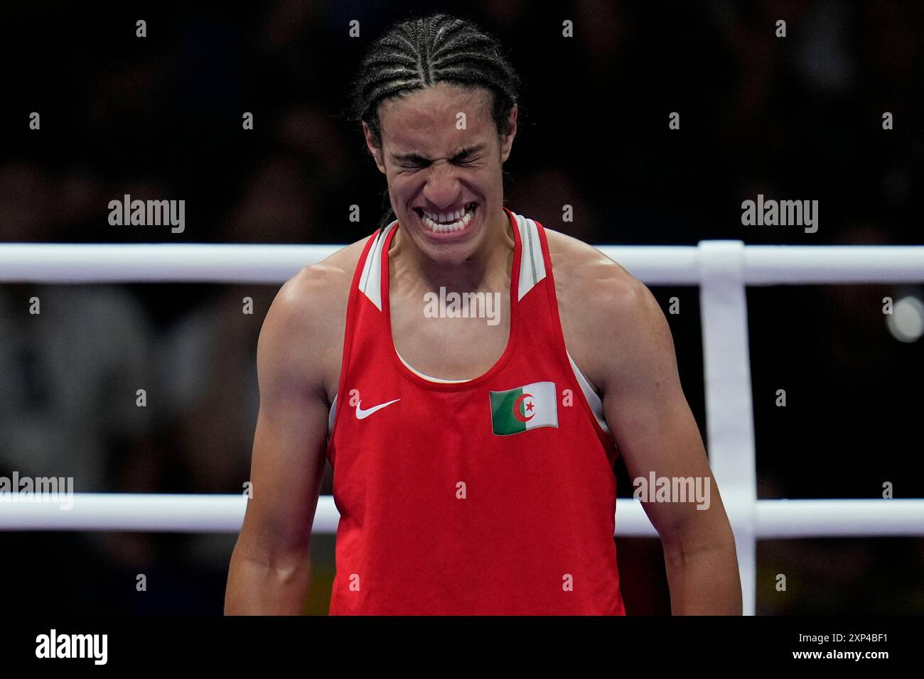 Algeria's Imane Khelif, celebrates after defeating Hungary's Anna ...