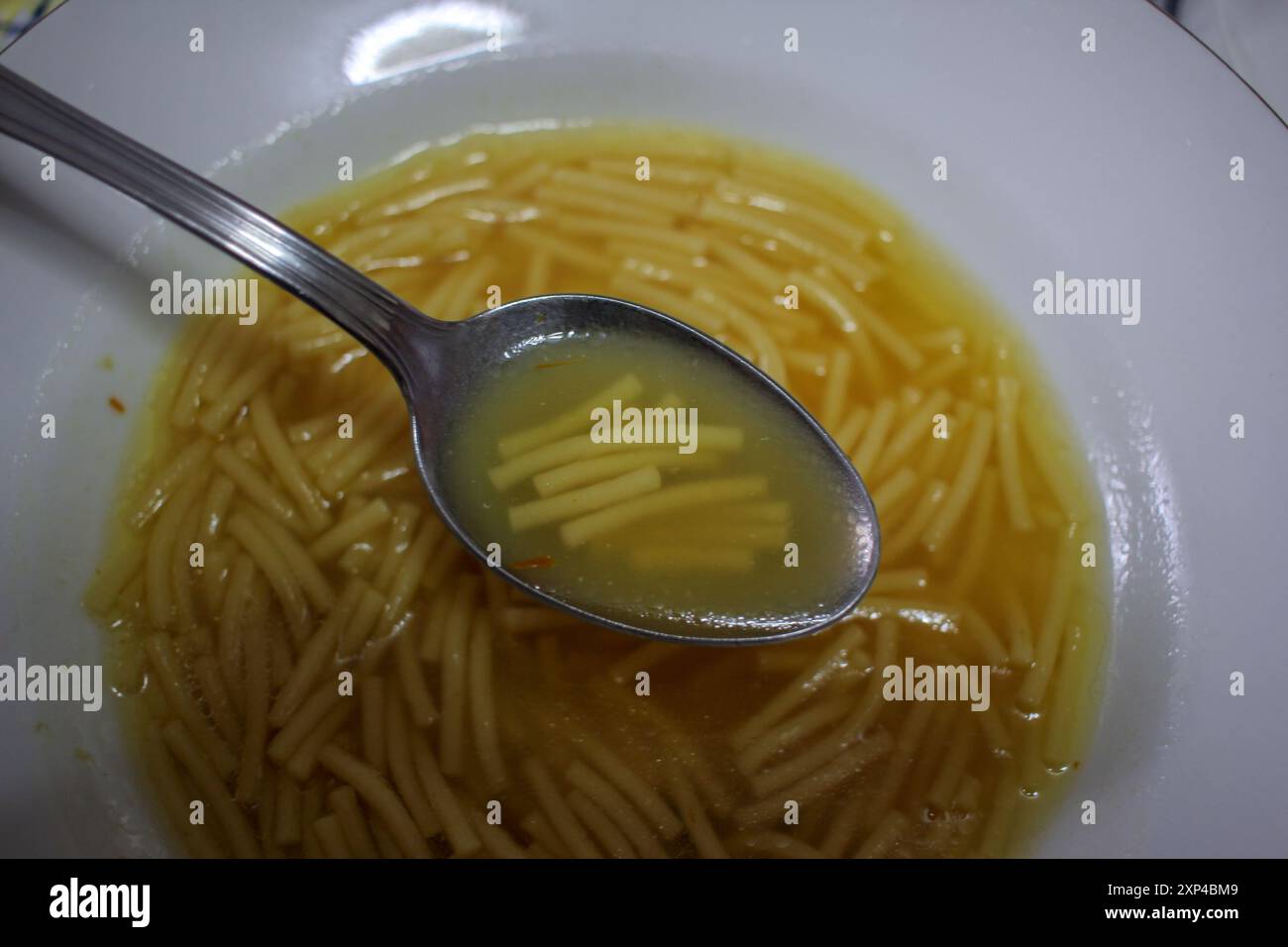 Spoon reaching hi-res stock photography and images - Alamy