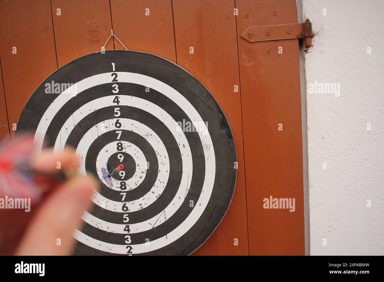 hitting the target with an arrow from my hand Stock Photo - Alamy