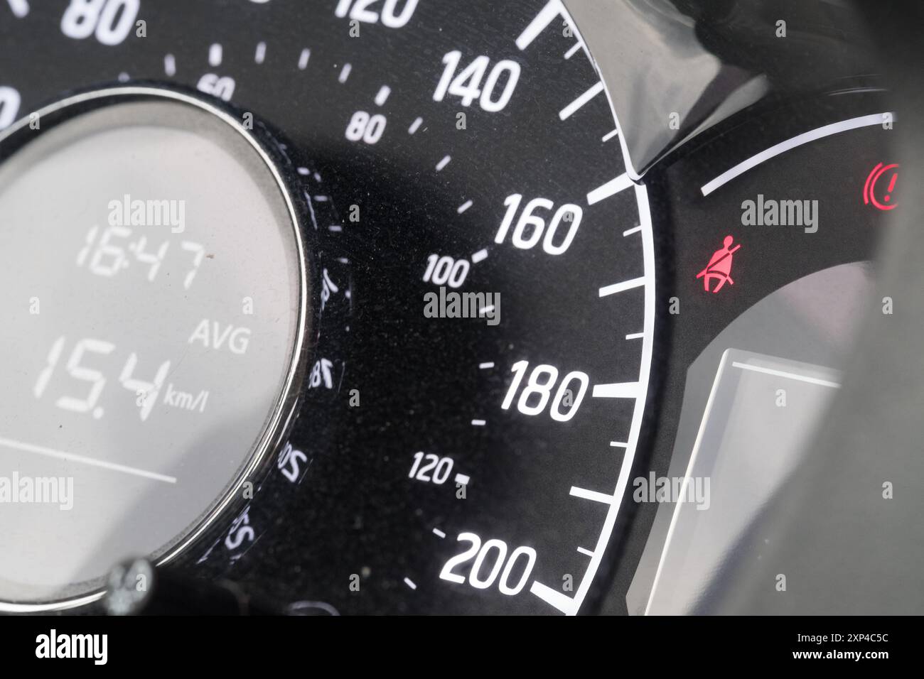 Car speedometer and tachometer close-up, highlighting speed and ...