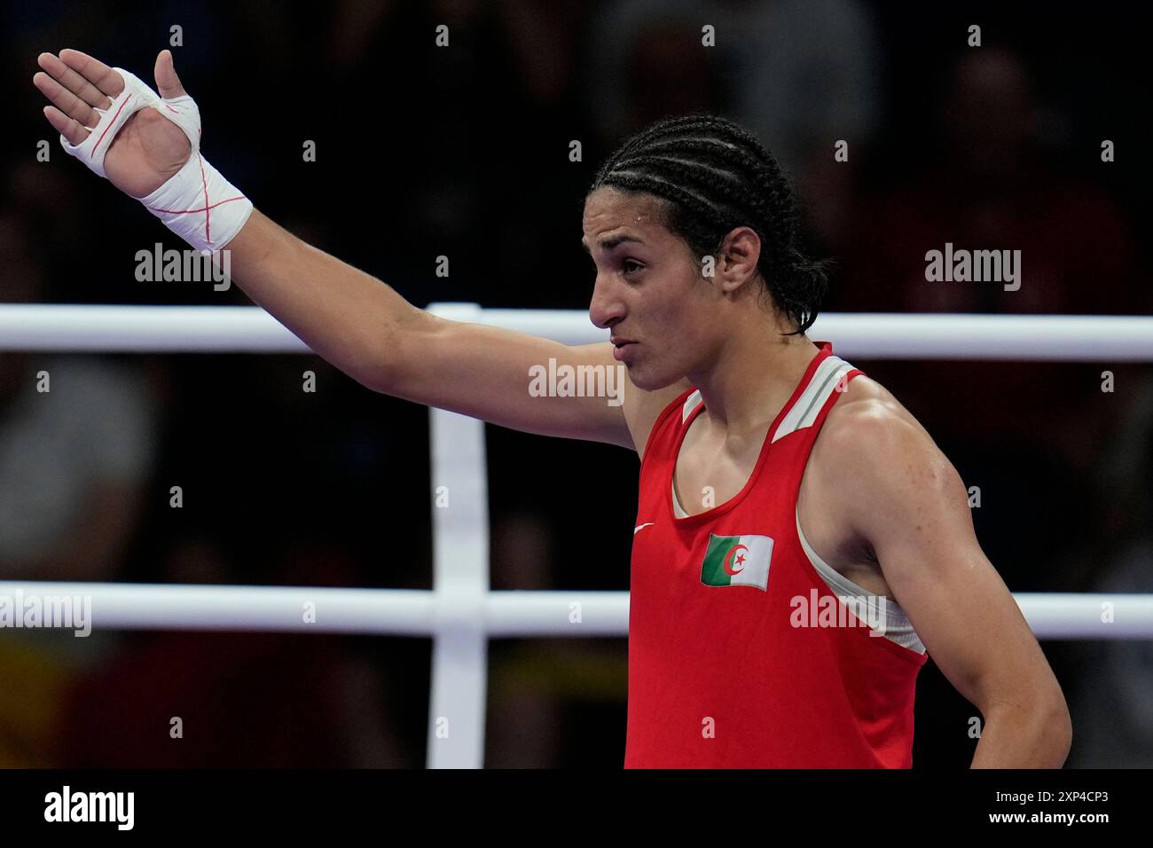 Algeria's Imane Khelif, celebrates after defeating Hungary's Anna ...