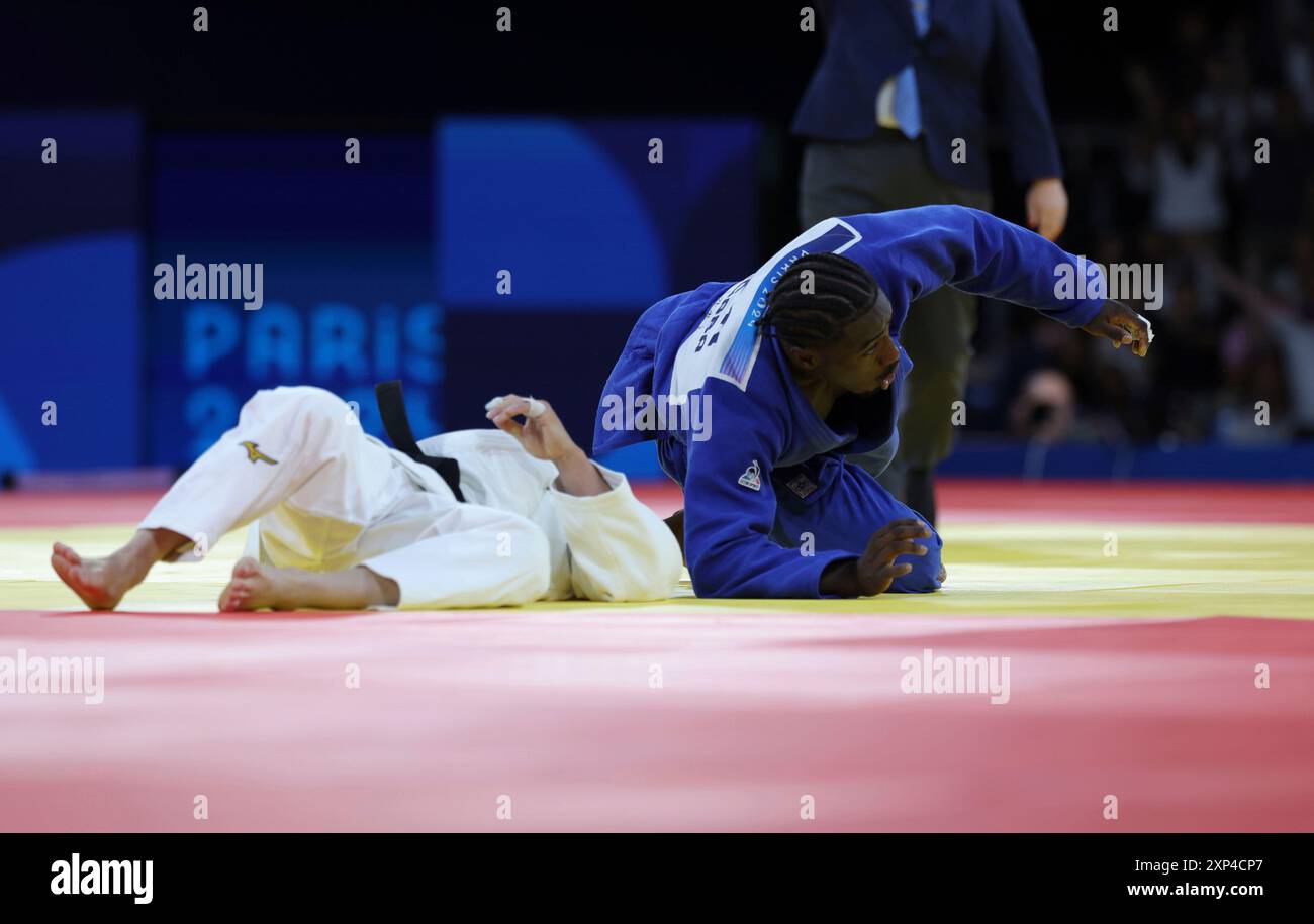 Gaba Joan-Benjamin of France (in blue) defeats ABE Hifumi of Japan in ...