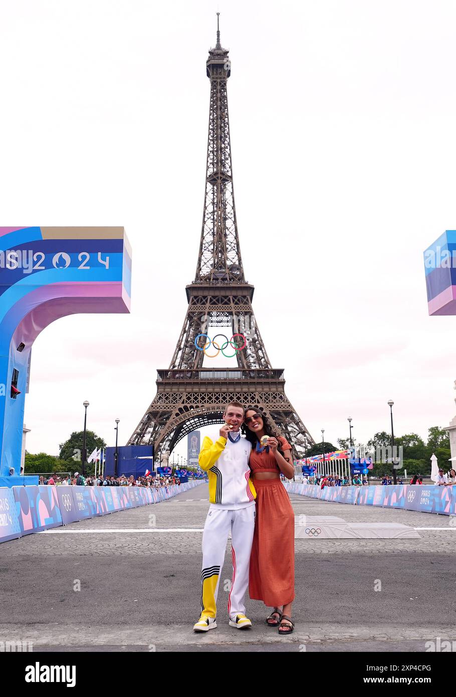 Belgium's Remco Evenepoel with his wife Oumaima Rayane and his two gold ...