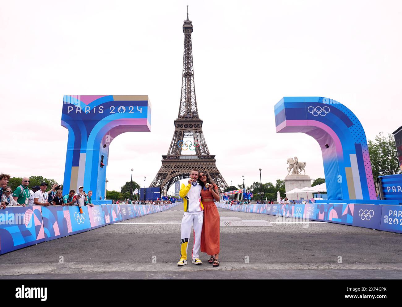 Belgium's Remco Evenepoel with his wife Oumaima Rayane and his two gold ...