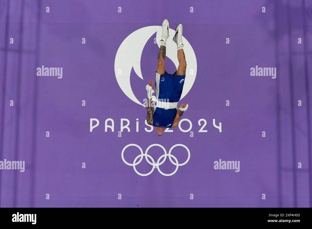 Australia's Charlie Senior, flips while celebrating after defeating ...