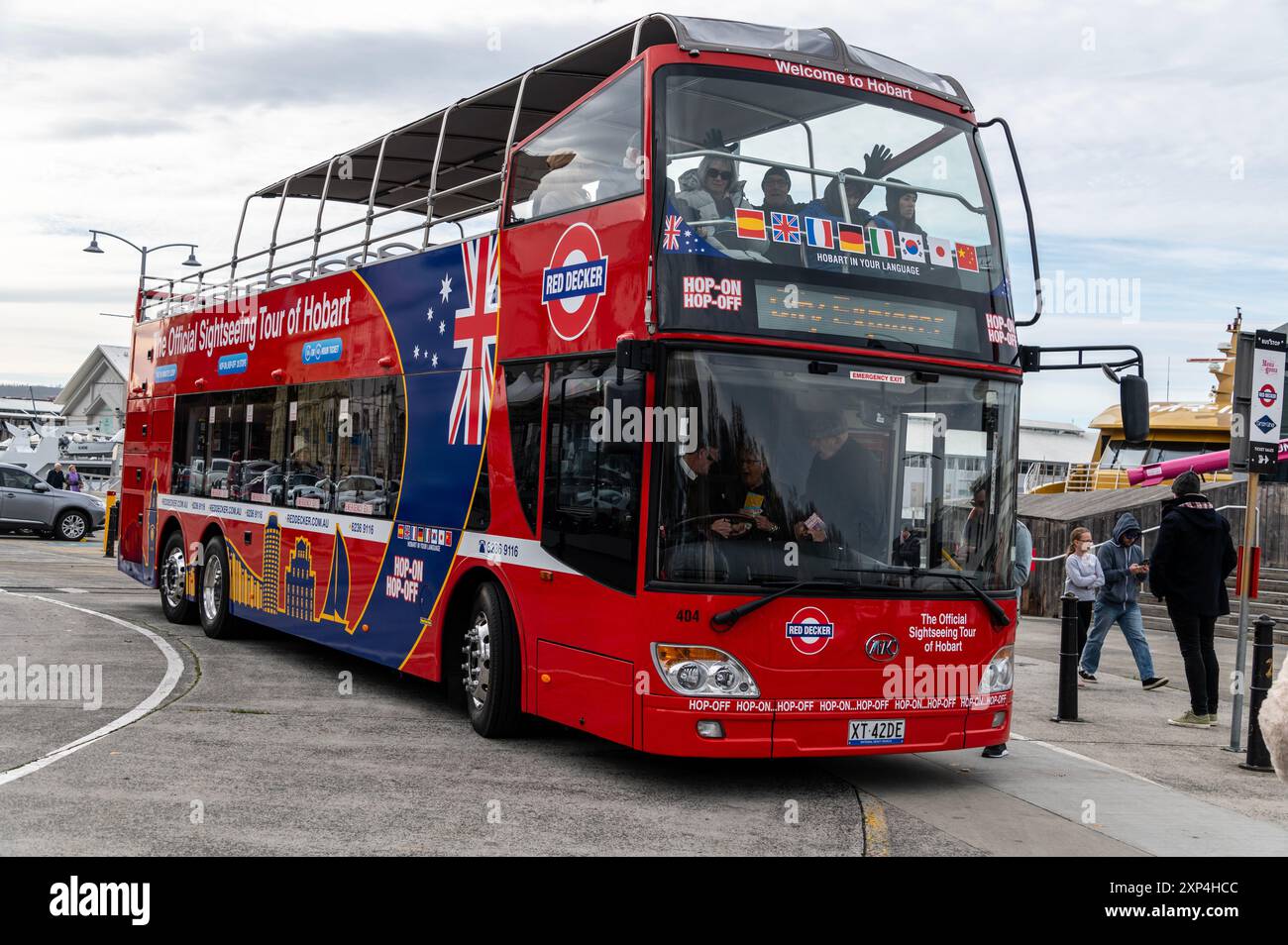 A tourist-sightseeing double-decker that goes around the local main ...