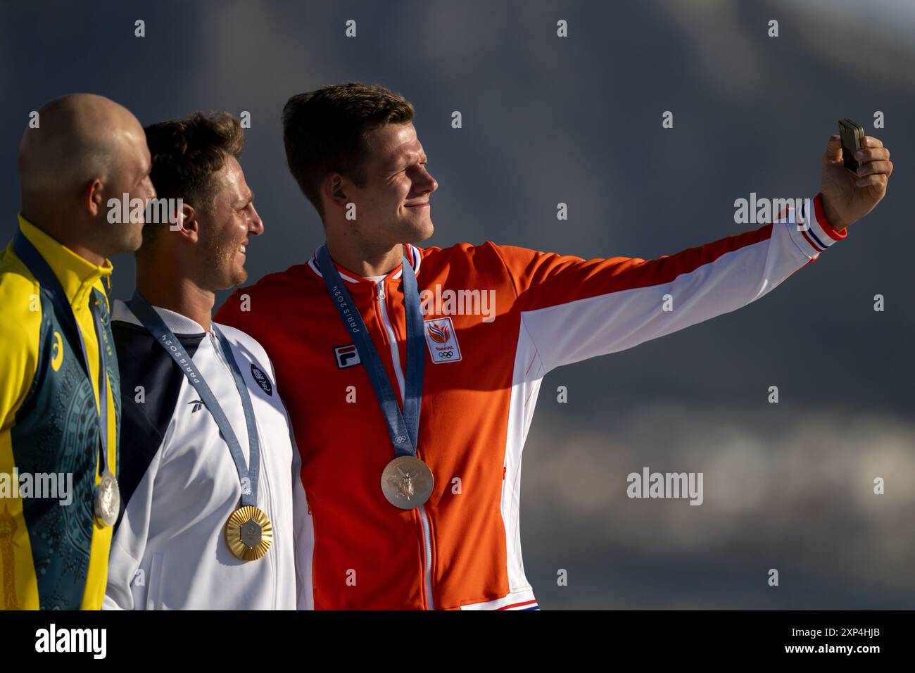 MARSEILLE - Windfoiler Luuc van Opzeeland (R) during the ceremony of ...