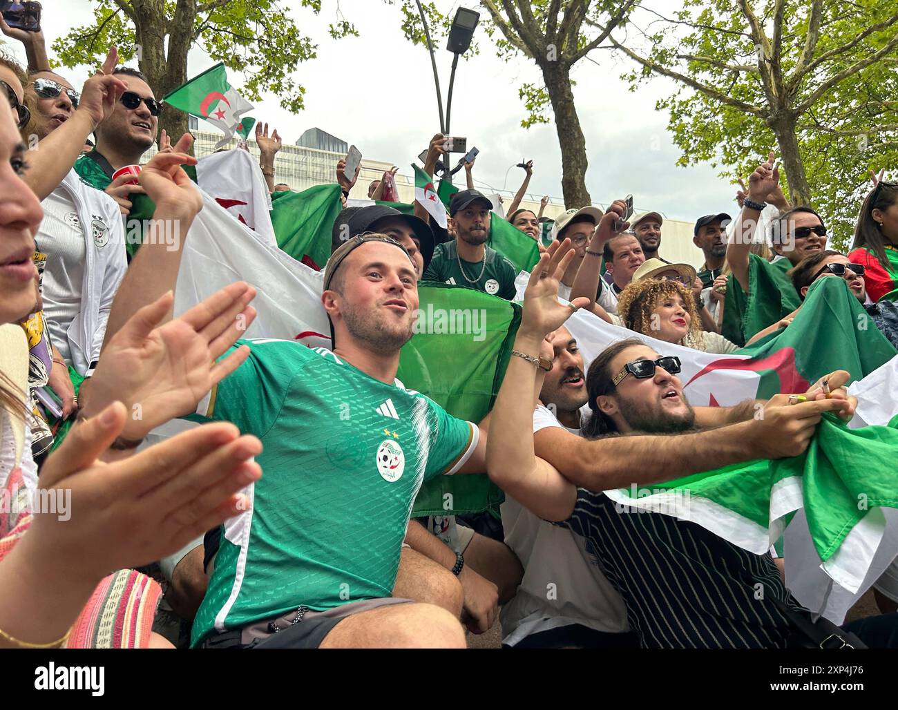 Fans of Algerian boxer Imane Khelif cheer outside the Olympic boxing ...