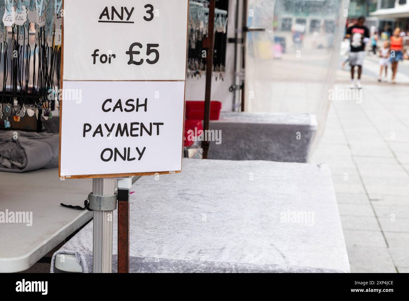 Cash payment only sign on a street market stall in Southend on Sea ...