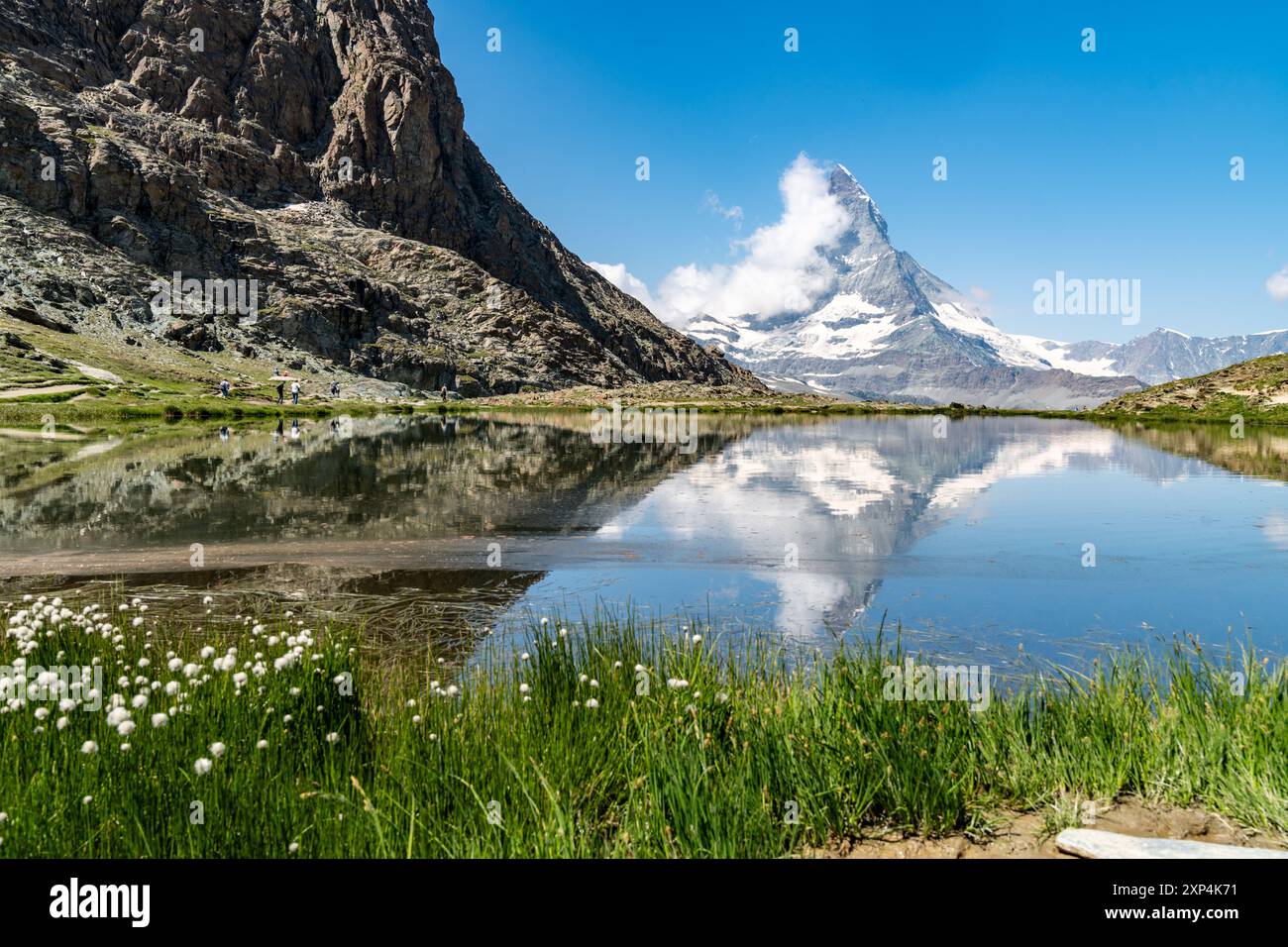 Riffelsee Lake and Matterhorn mountain in the Alps with reflection ...