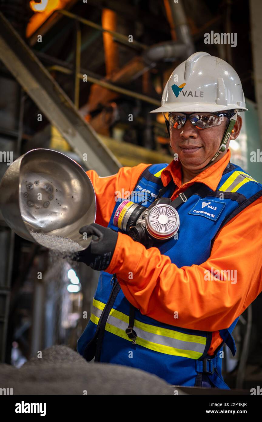 August 2, 2024, Sorowako, South Sulawesi, Indonesia: Workers inspect ...