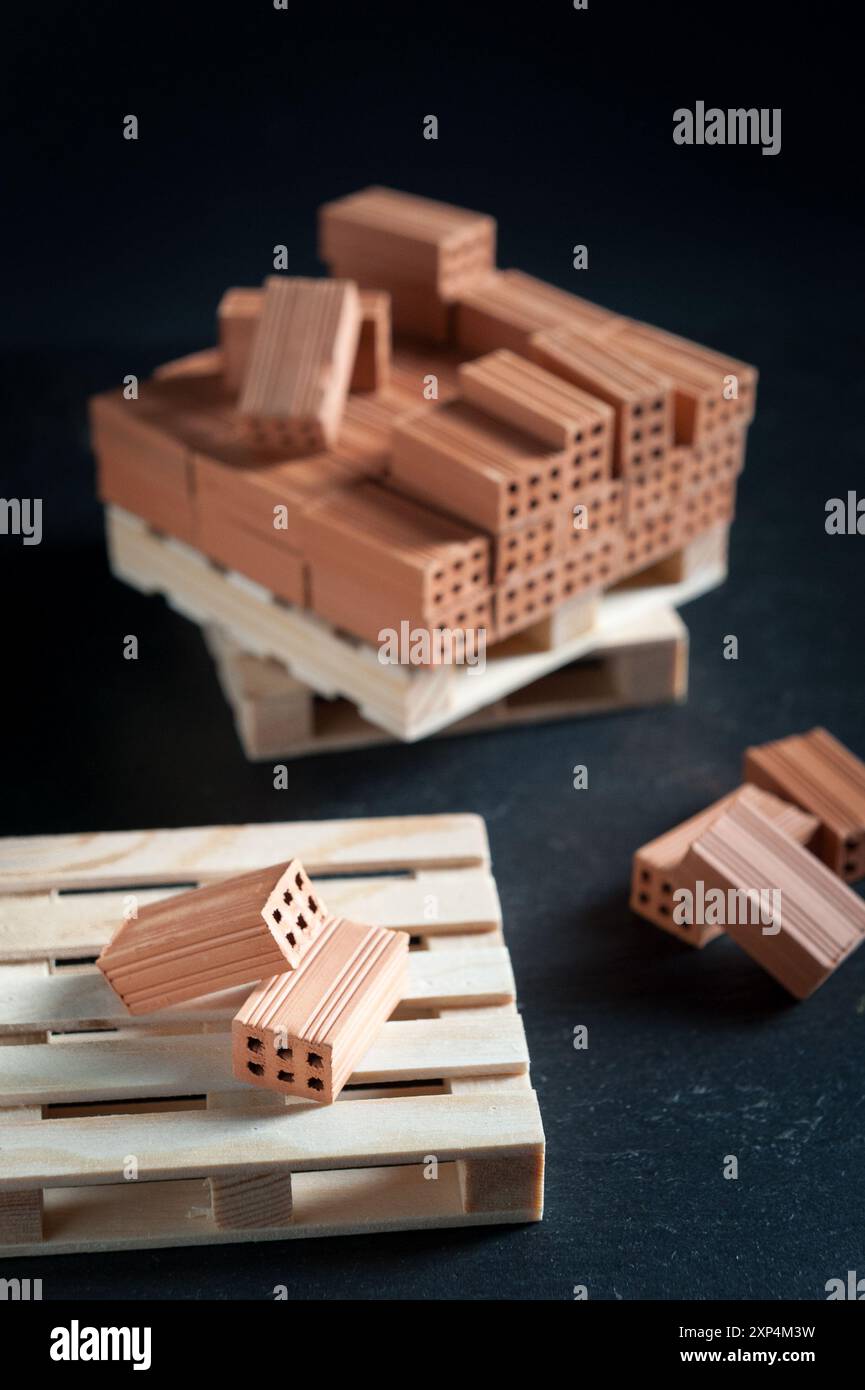 Clay bricks used for close-up miniature on black background Stock Photo ...