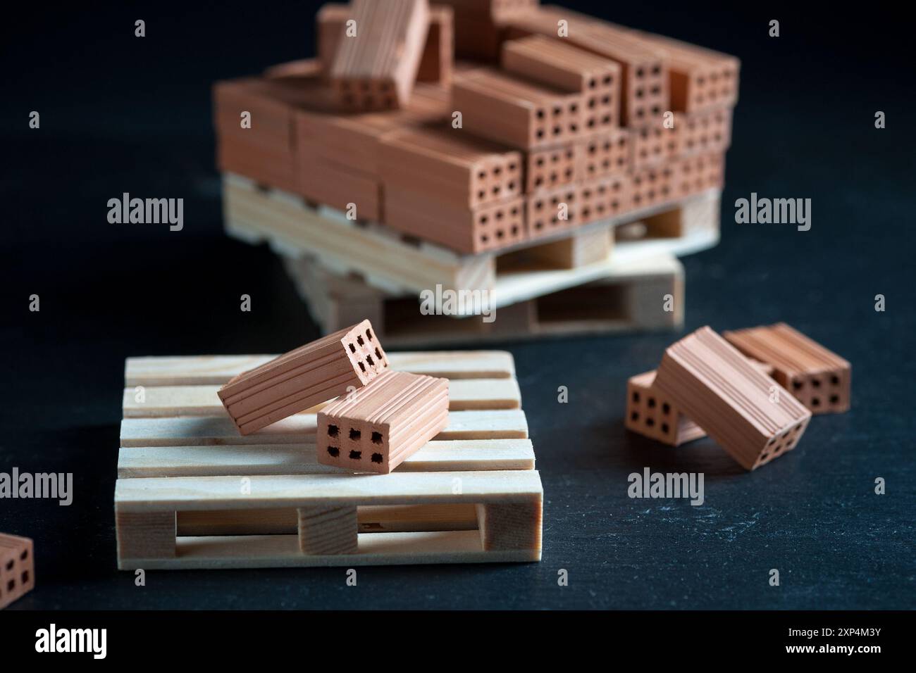 Clay bricks used for close-up miniature on black background Stock Photo ...