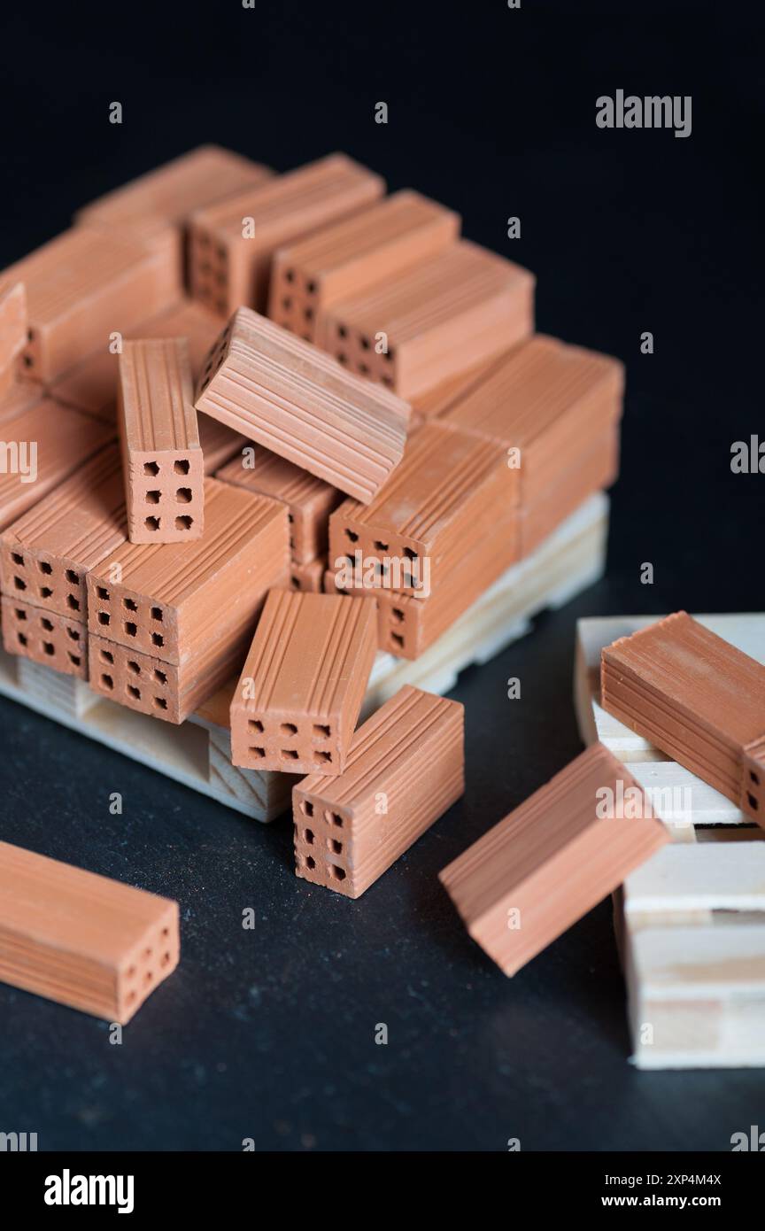 Clay bricks used for close-up miniature on black background Stock Photo ...