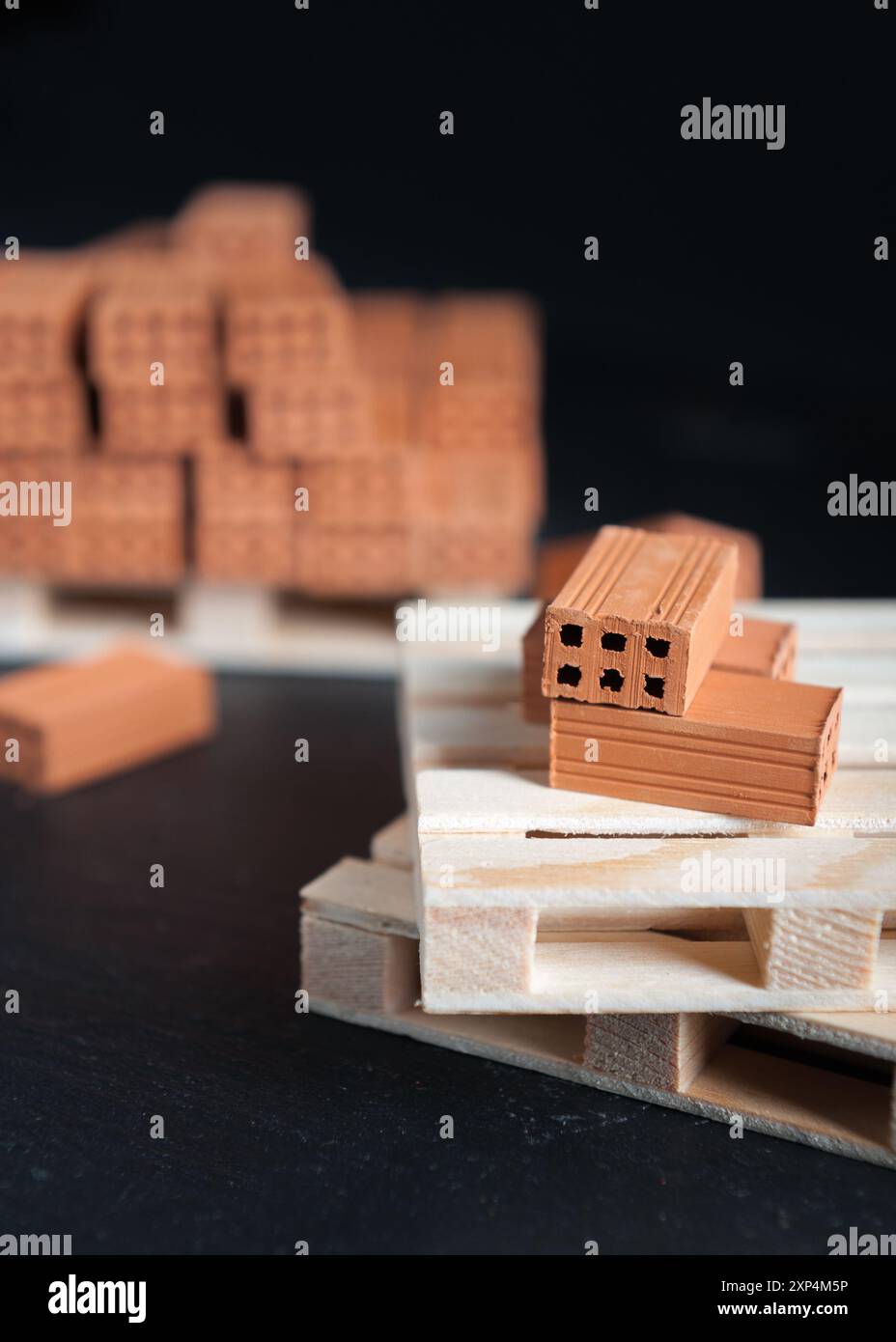 Clay bricks used for close-up miniature on black background Stock Photo ...
