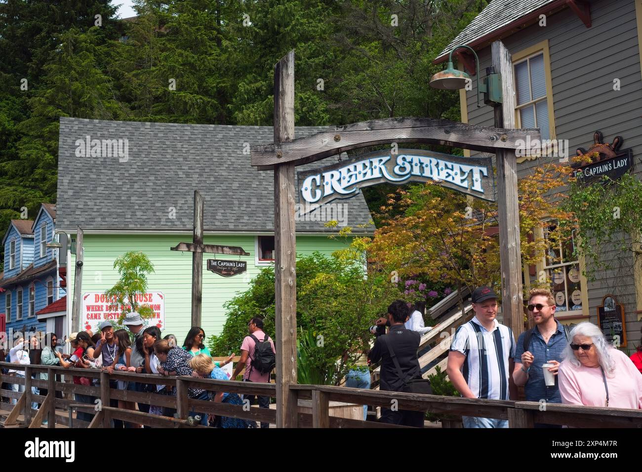 Crowds of cruise ship visitors line the boardwalk at Creek Street, the ...
