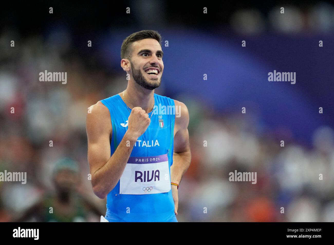 Federico Riva, of Italy, reacts after finishing a men's 1500 meters ...