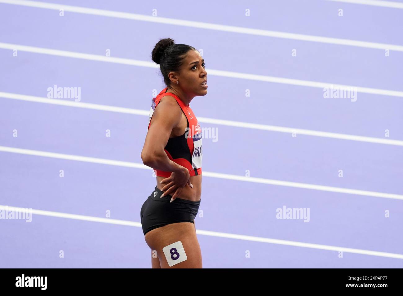 Mujinga Kambundji, of Switzerland, reacts after finishing her women's ...