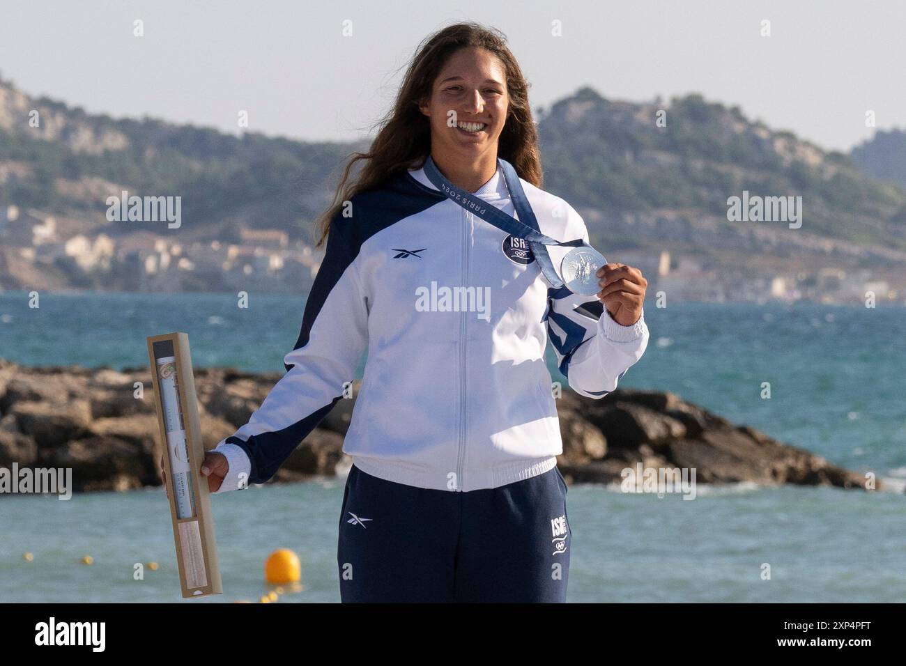 Sharon Kantor of Israel holds her women's iQFOiL windsurfing silver ...