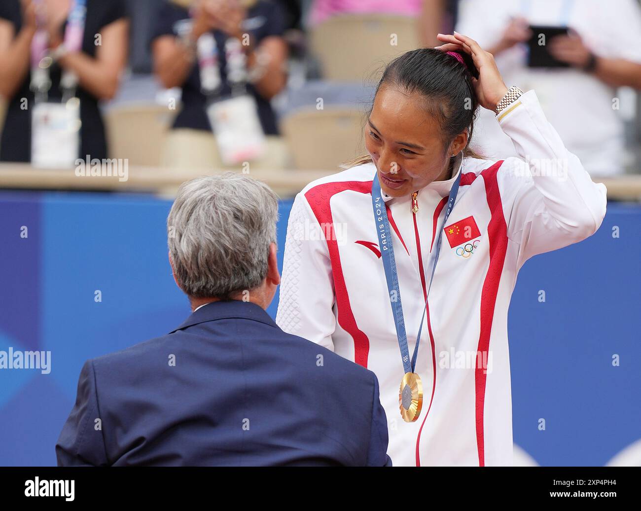 Paris, France. 3rd Aug, 2024. Gold medalist Zheng Qinwen (R) of China ...