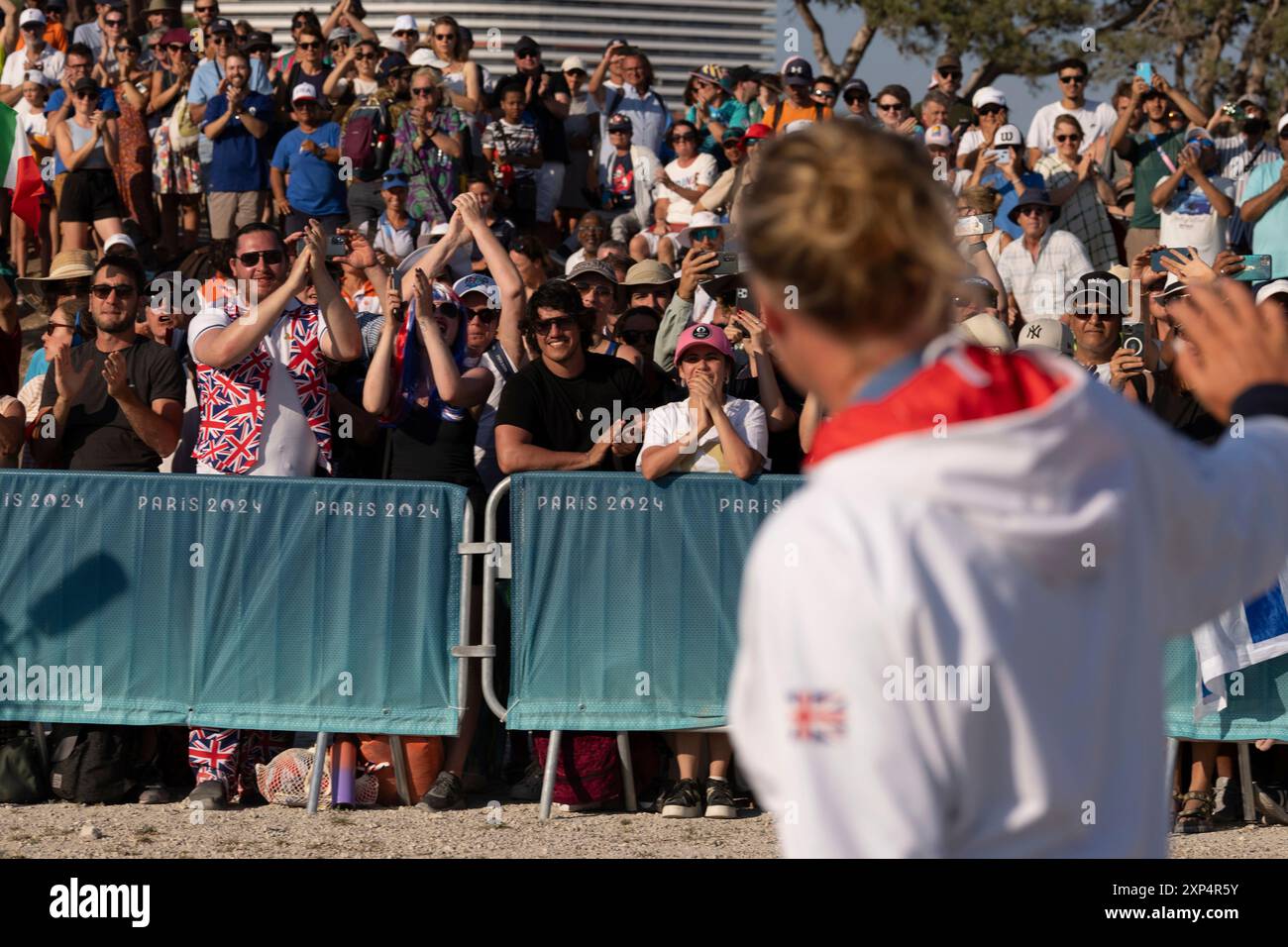 Emma Wilson of Britain, who won the women's iQFOiL windsurfing bronze ...