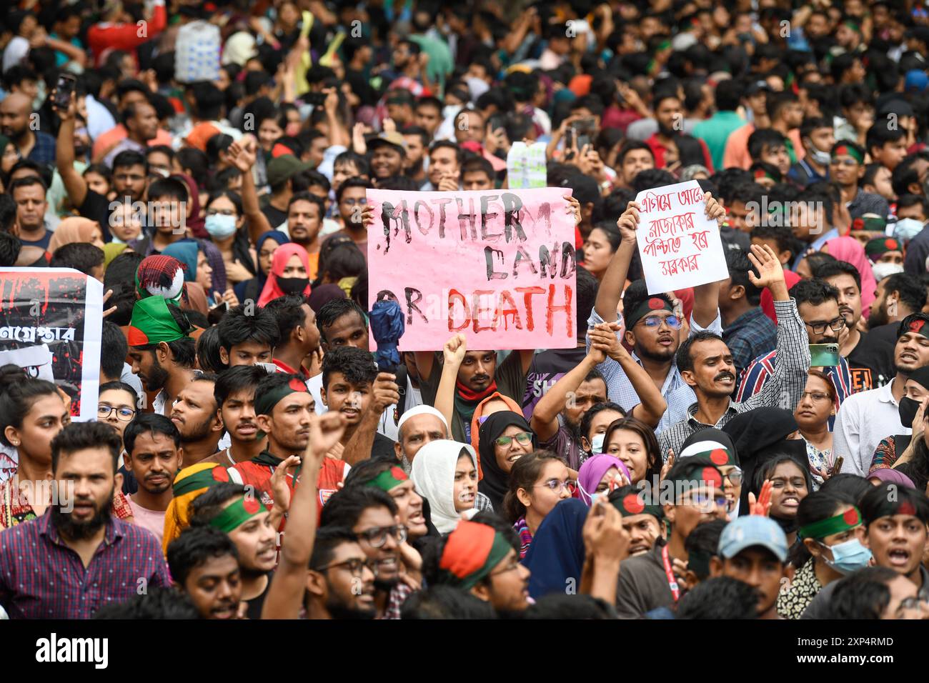Dhaka, Bangladesh. 3rd Aug 2024. Protesters shout slogans during a ...