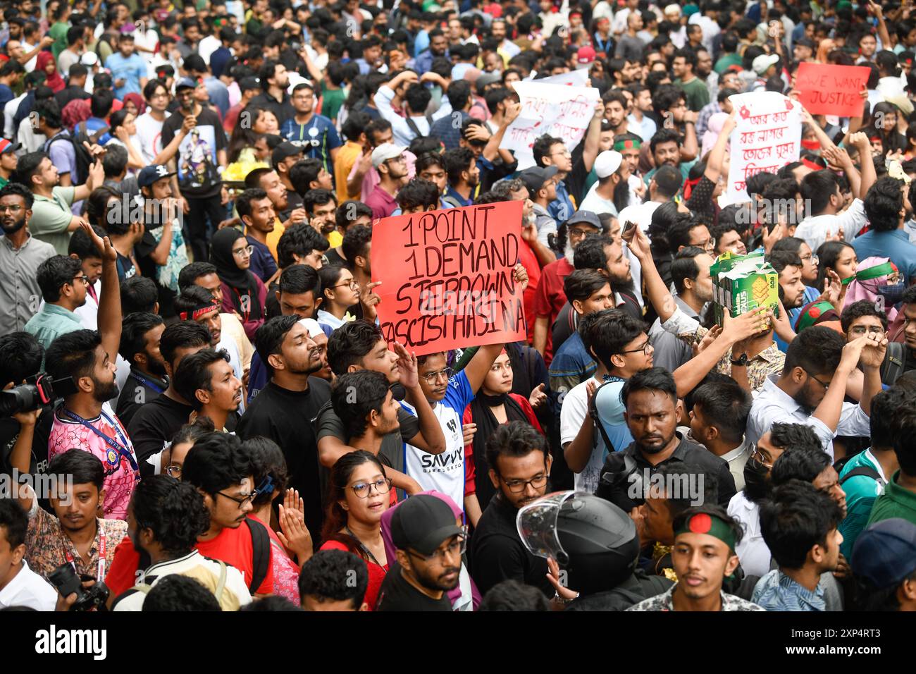 Dhaka, Bangladesh. 3rd Aug 2024. Students hold placards during a ...