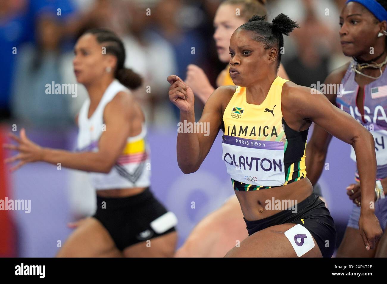 Tia Clayton, of Jamaica, competes in the women's 100-meter semifinals ...