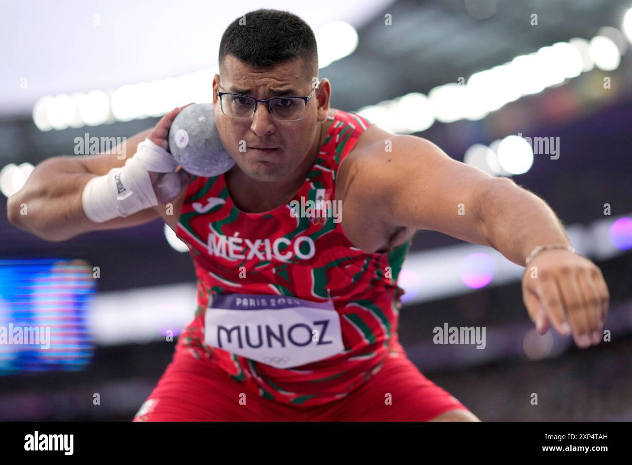 Uziel Munoz, of Mexico, competes in the men's shot put final at the ...