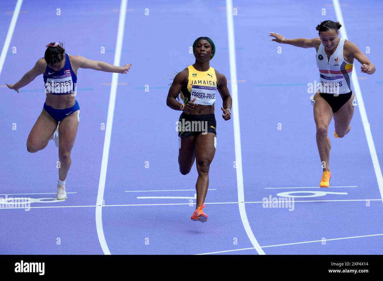 Shelly-Ann Fraser-Pryce, of Jamaica, runs ins a wins a women's 100-meter heat at the 2024 Summer ...