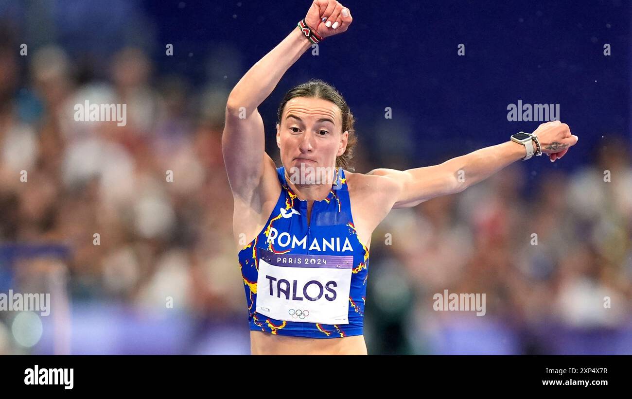 Elena Andreea Talos, of Romania, competes in the women's triple jump ...