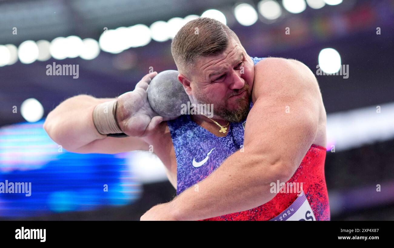 Joe Kovacs, of the United States, competes in the men's shot put final ...