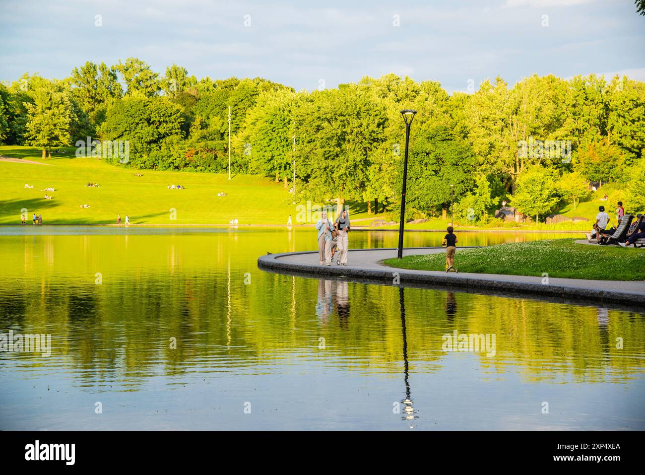 Montreal, Canada - July 14 2024: Castor Lake on the top of Mont Royal ...
