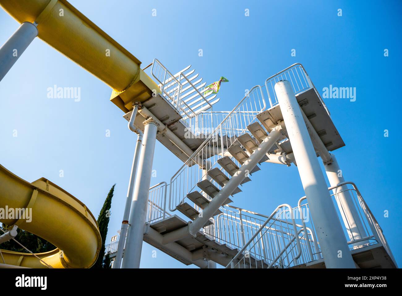 Water Slide Stairs Structure Summer - A low-angle view of a white steel ...