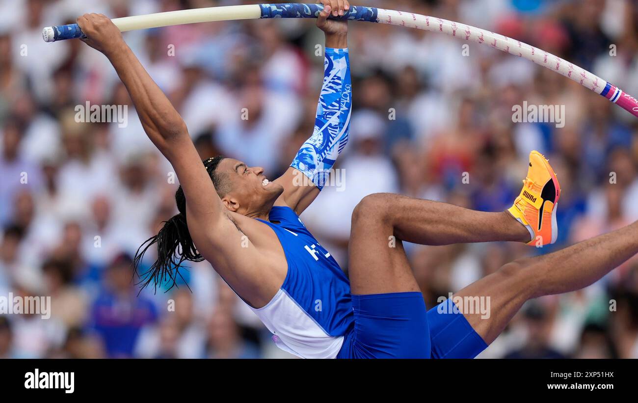 Emmanouil Karalis, of Greece, competes in the men's pole vault ...